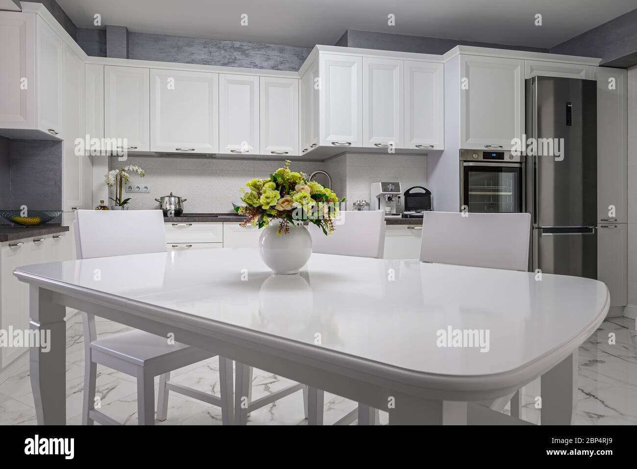 Simple and luxury modern white kitchen interior Stock Photo - Alamy