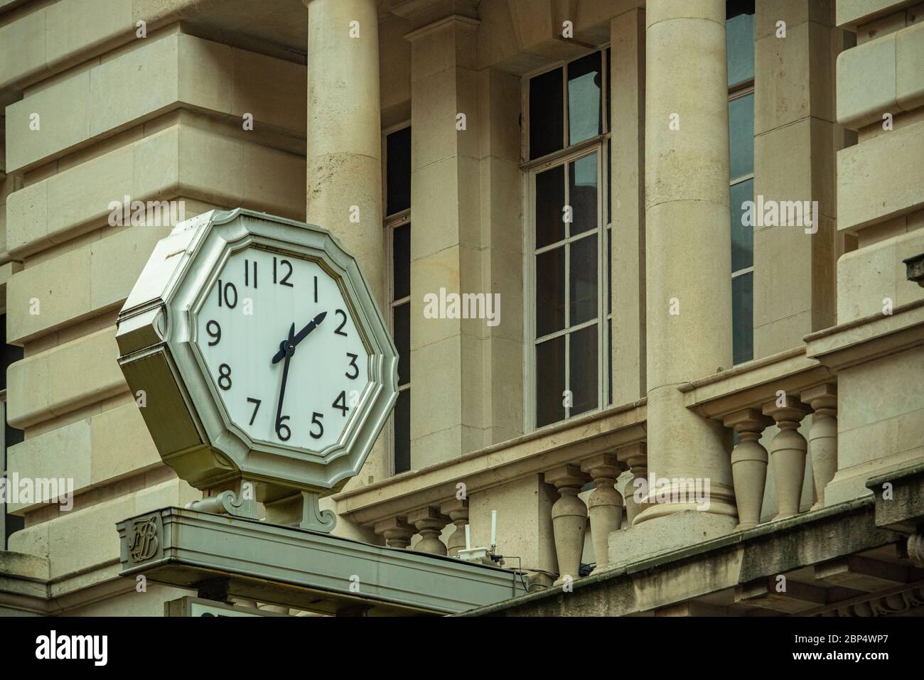 Vintage clock closeup view in Manchester street in England, United ...