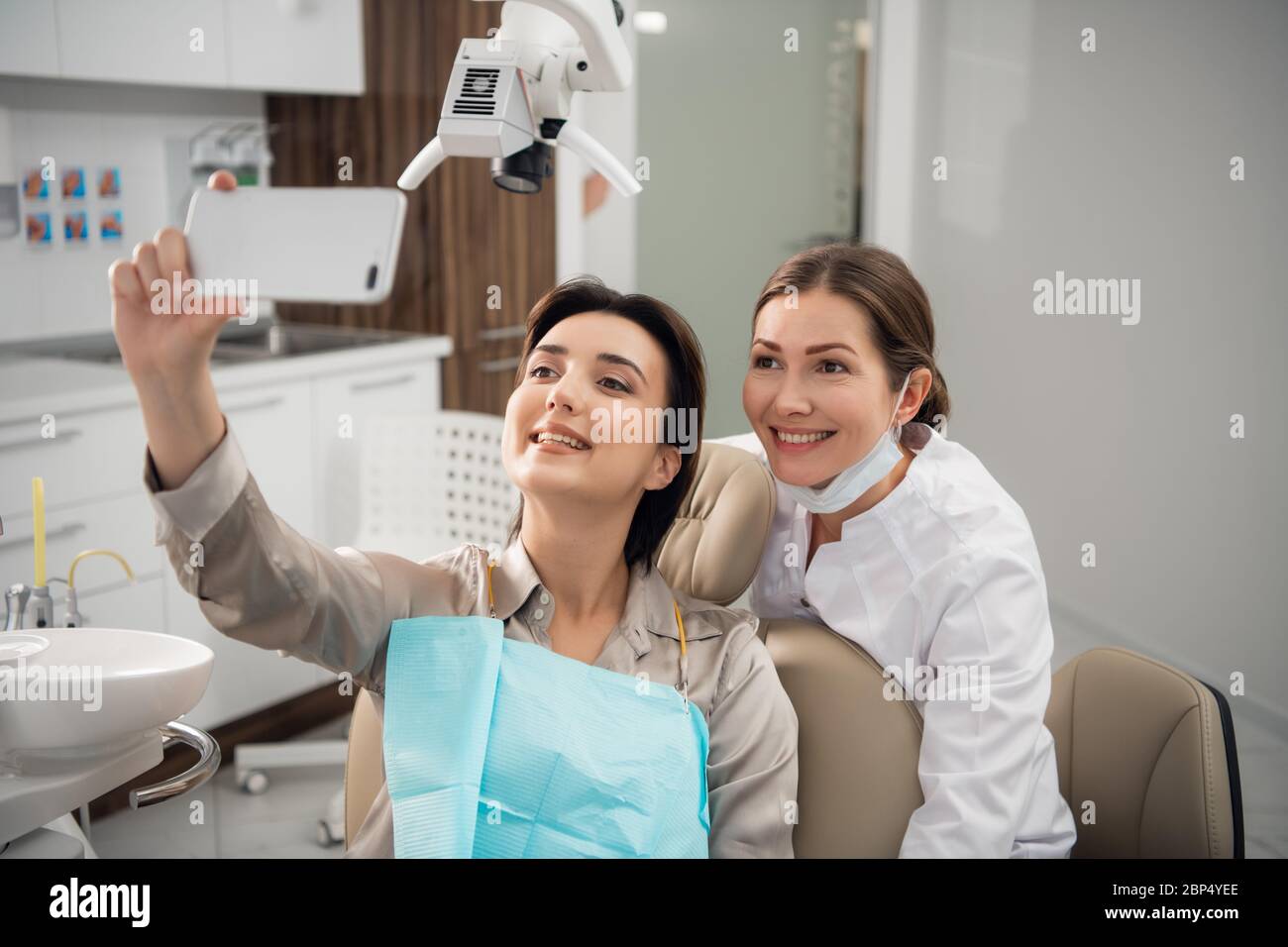 Doctor and patient selfie in the operating room. Happy Patient Is ...