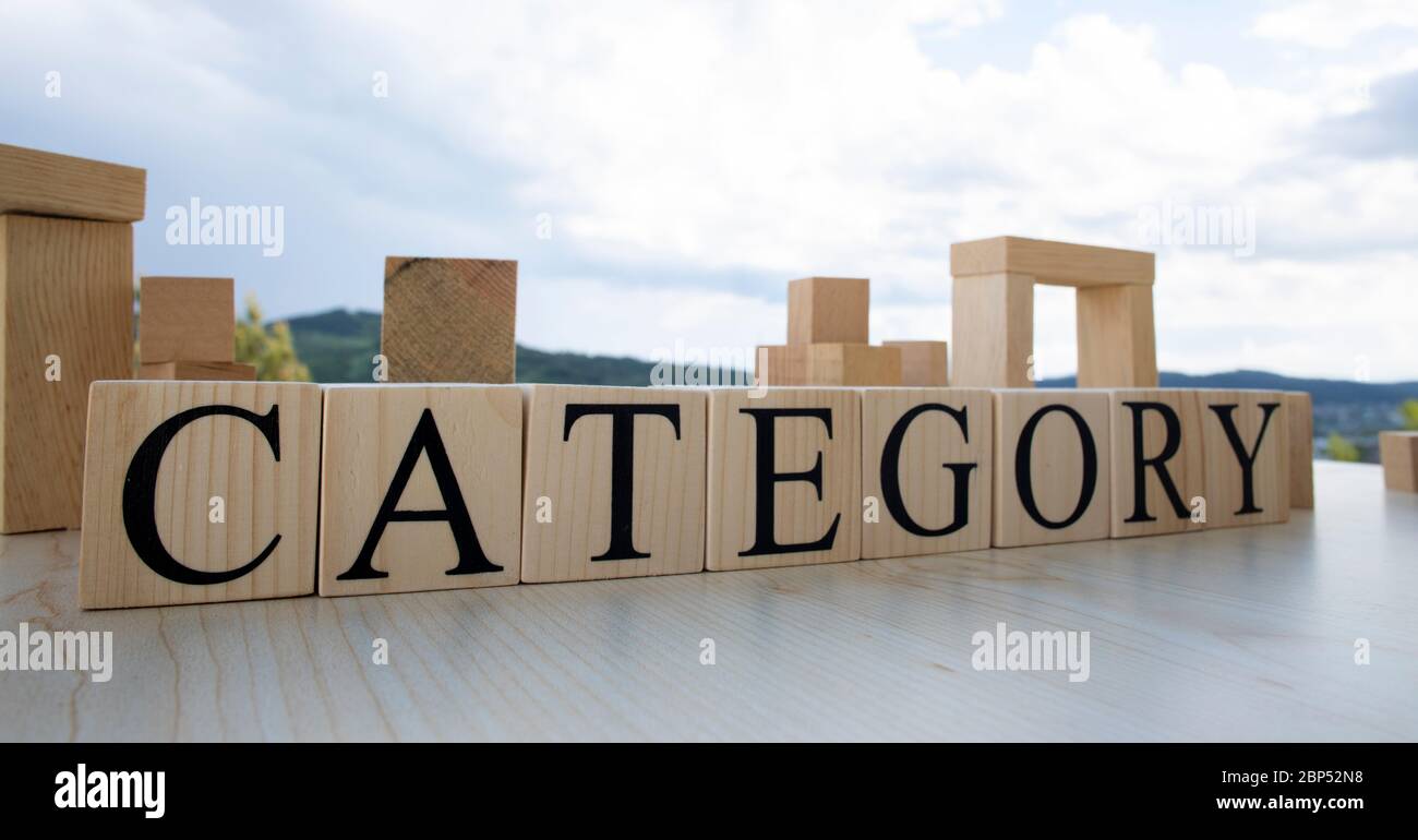 Category blocks wooden blocks font. A photo was taken on the table ...