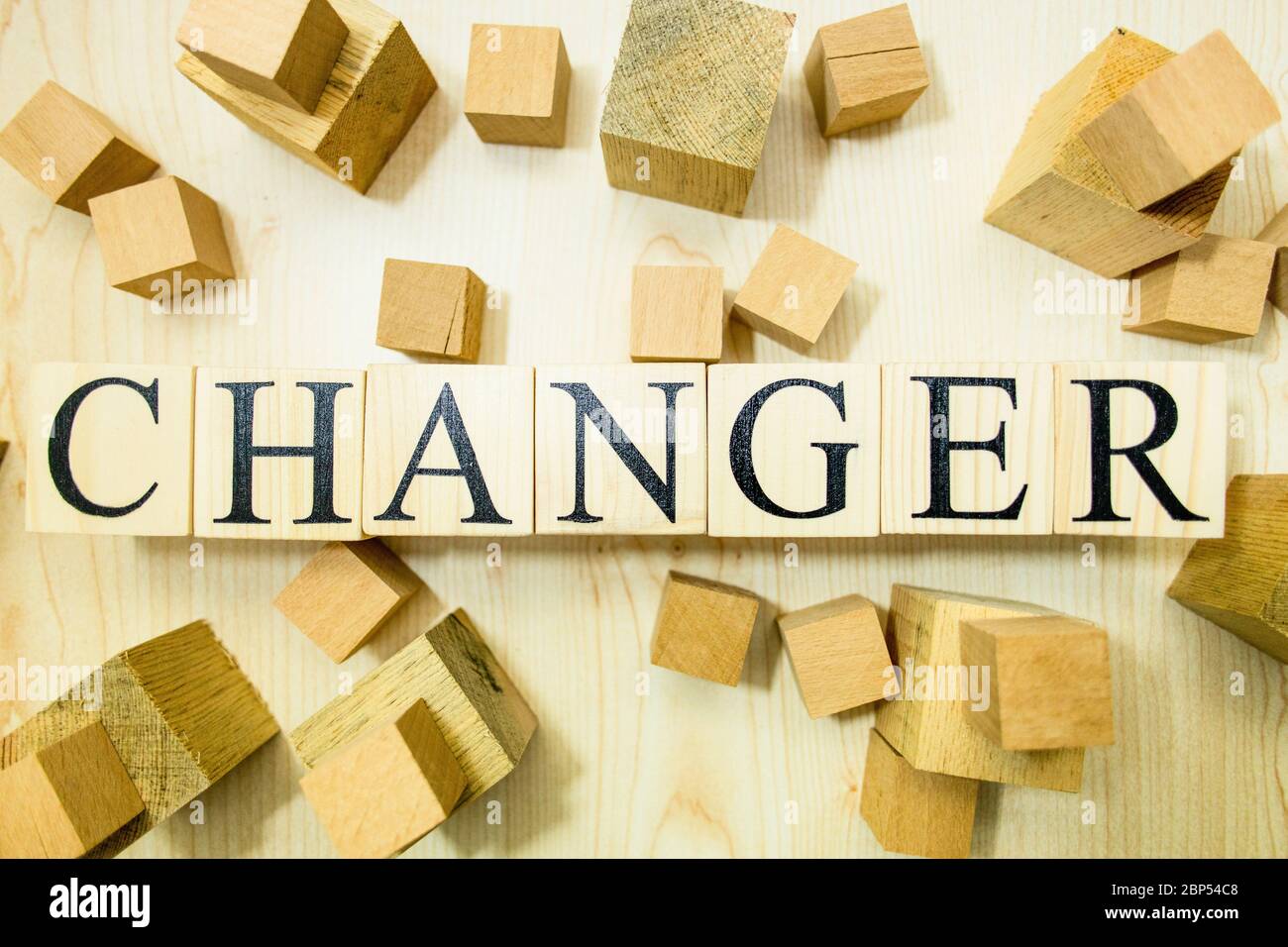 Game changer text on wooden cube blocks. Close up Stock Photo - Alamy