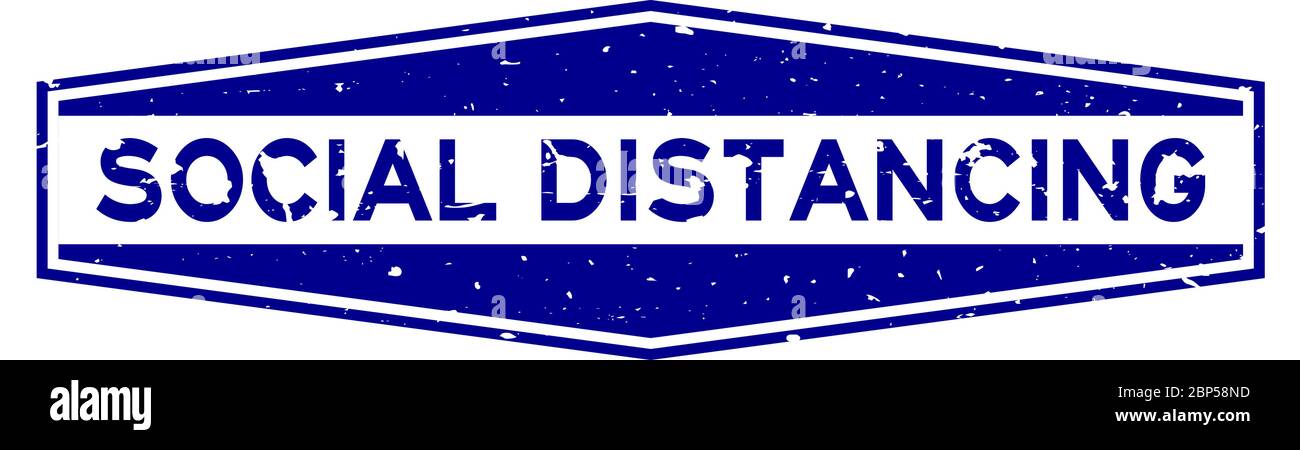 Grunge blue social distancing word hexagon rubber seal stamp on white ...