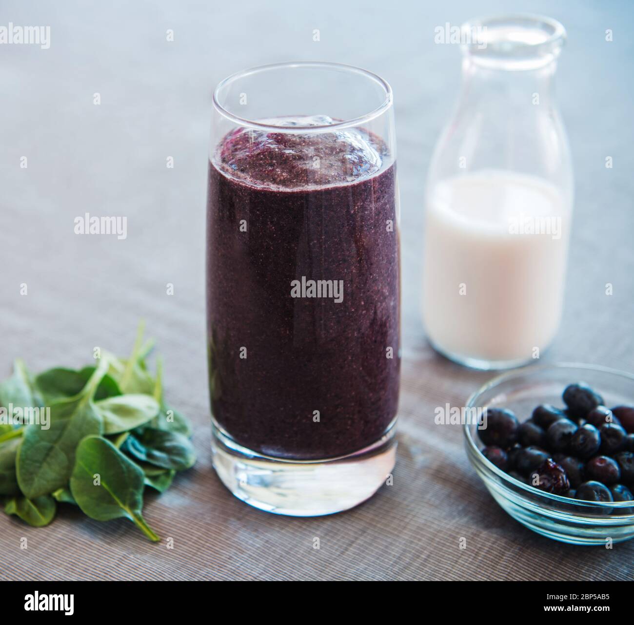 Healthy Blueberry smoothie with milk Stock Photo - Alamy