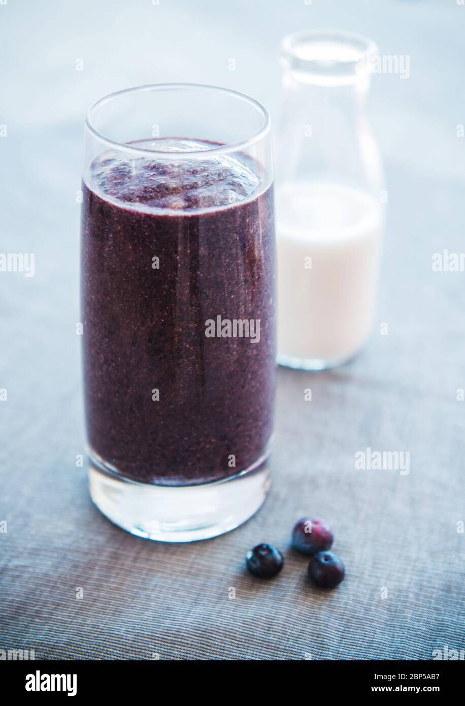 Healthy Blueberry smoothie with milk Stock Photo - Alamy