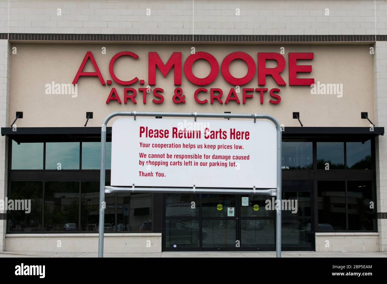 A logo sign outside of a defunct A.C. Moore retail store location in ...