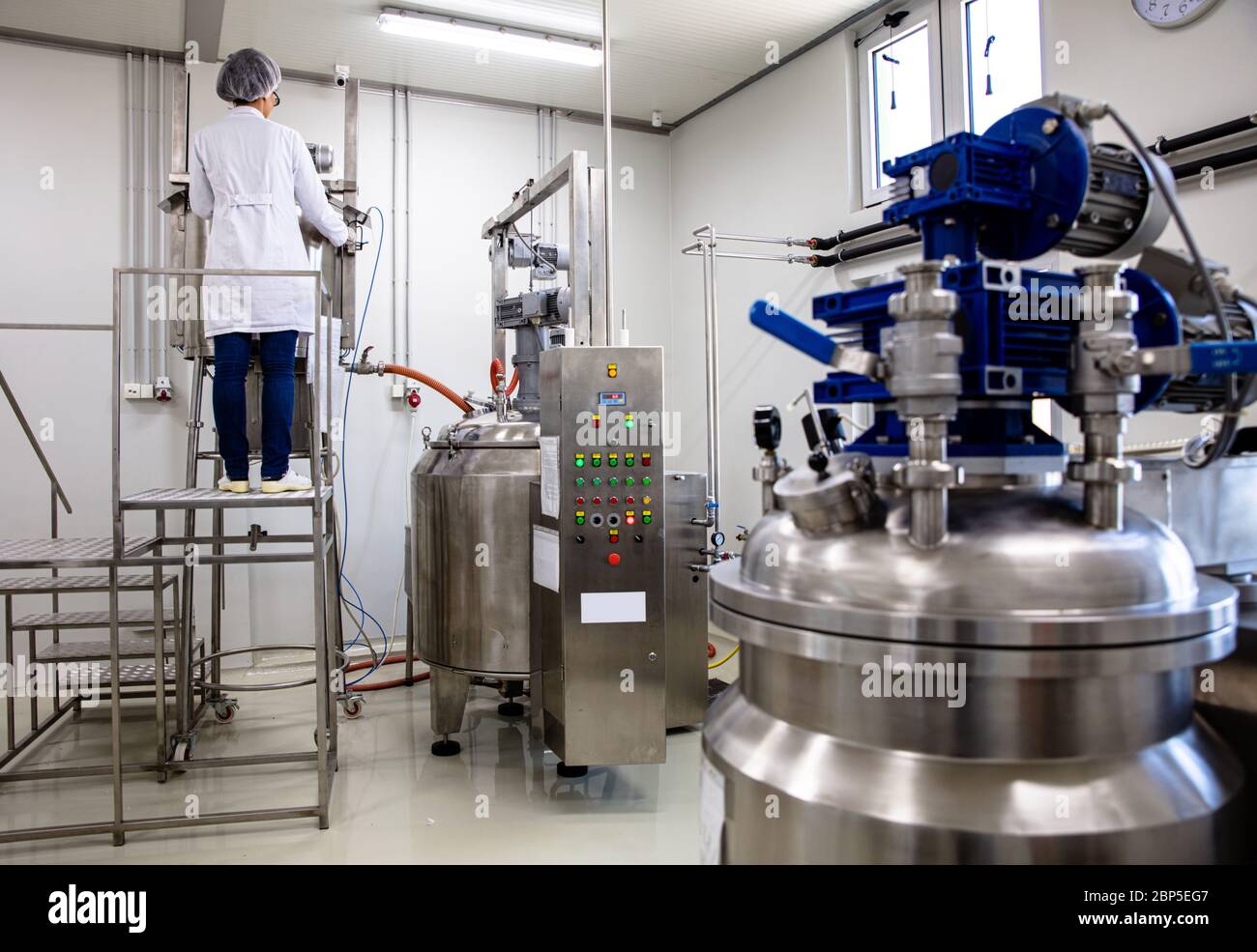 Cosmetic industry equipment and production process Stock Photo - Alamy