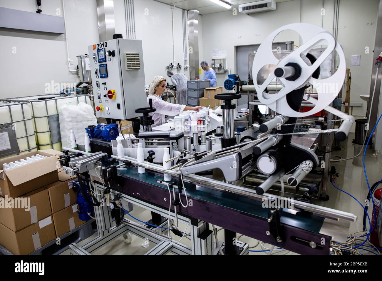 Cosmetic industry equipment and production process Stock Photo - Alamy