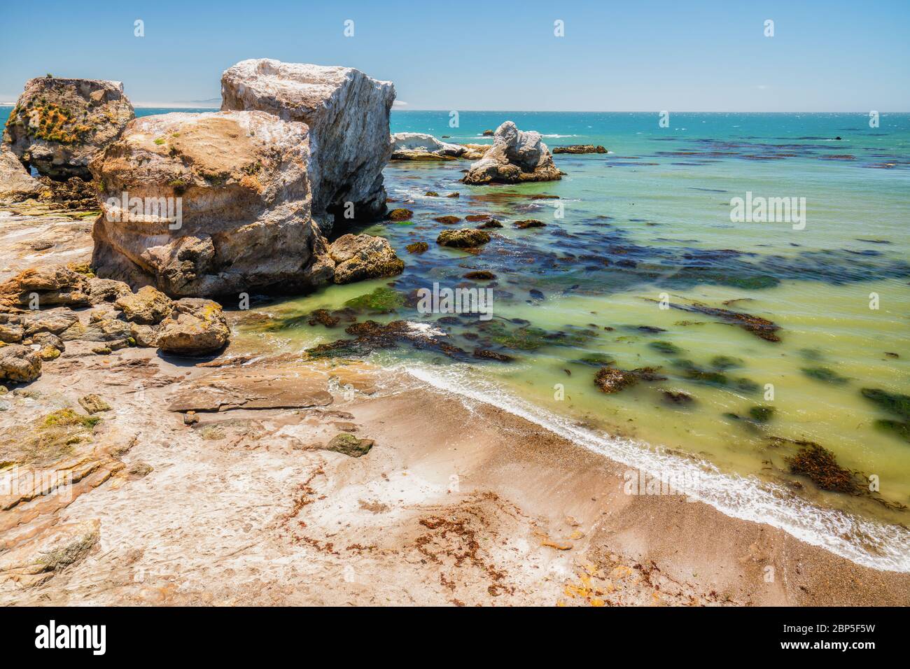 Rocky cliffs at low tide. Sunny day at Pismo Beach, beautiful Central ...