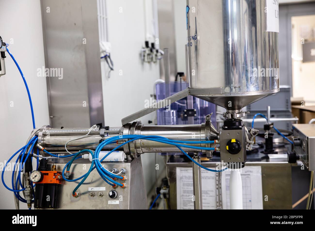 Cosmetic industry equipment and production process Stock Photo - Alamy