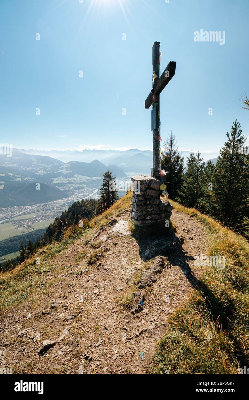 Cross at the top of a hiking trail on the outskirts of Brandenberg with ...