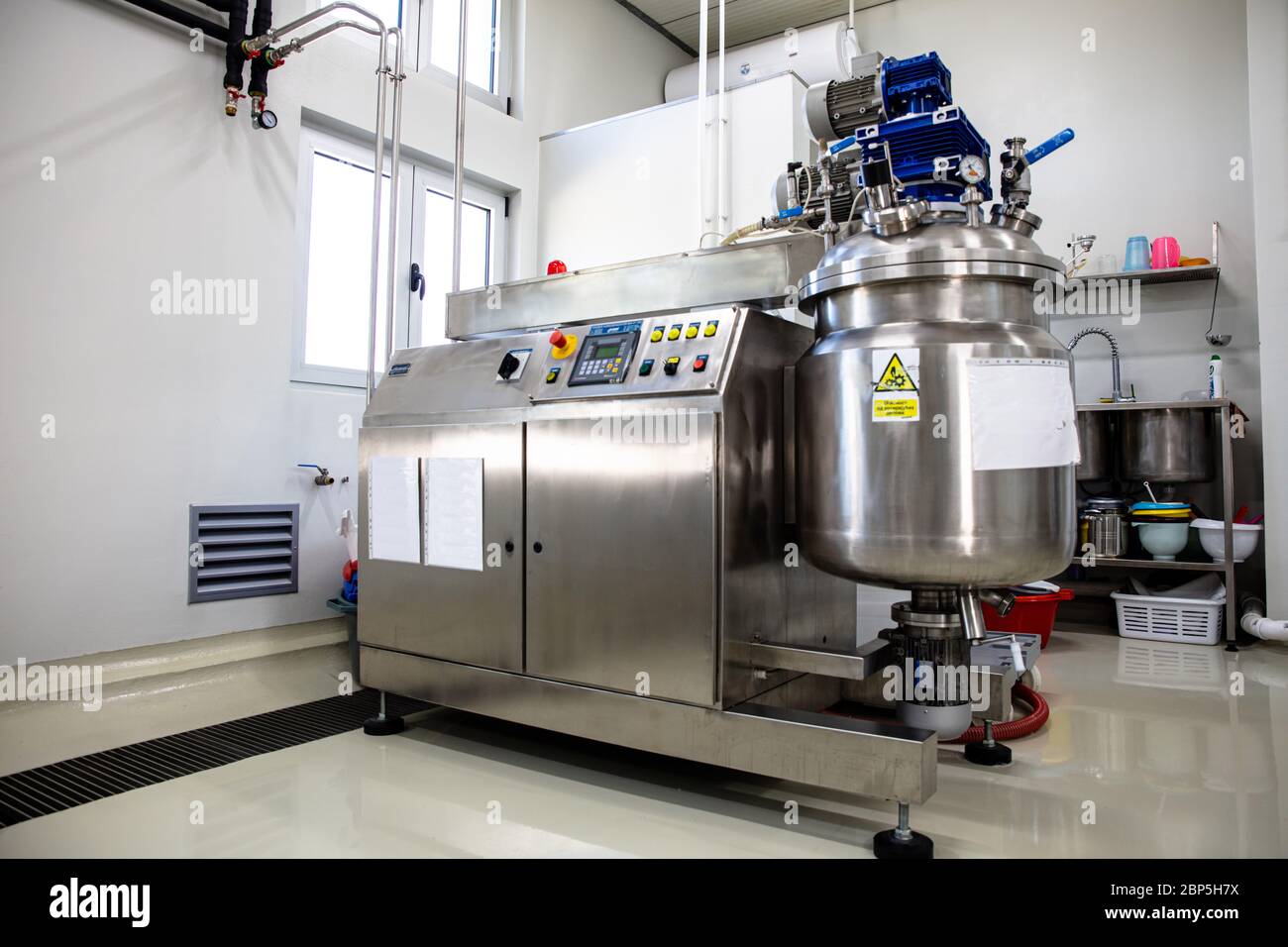 Cosmetic industry equipment and production process Stock Photo - Alamy