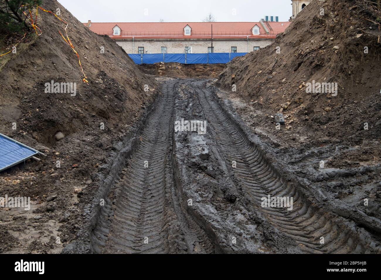 Deep mud ruts in the dirt at a construction site for apartments in Old ...