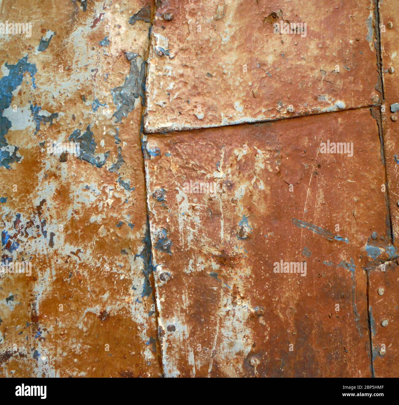 rusty colored metal plate background image Stock Photo - Alamy