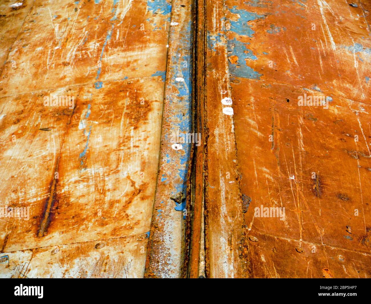 rusty colored metal plate background image Stock Photo - Alamy