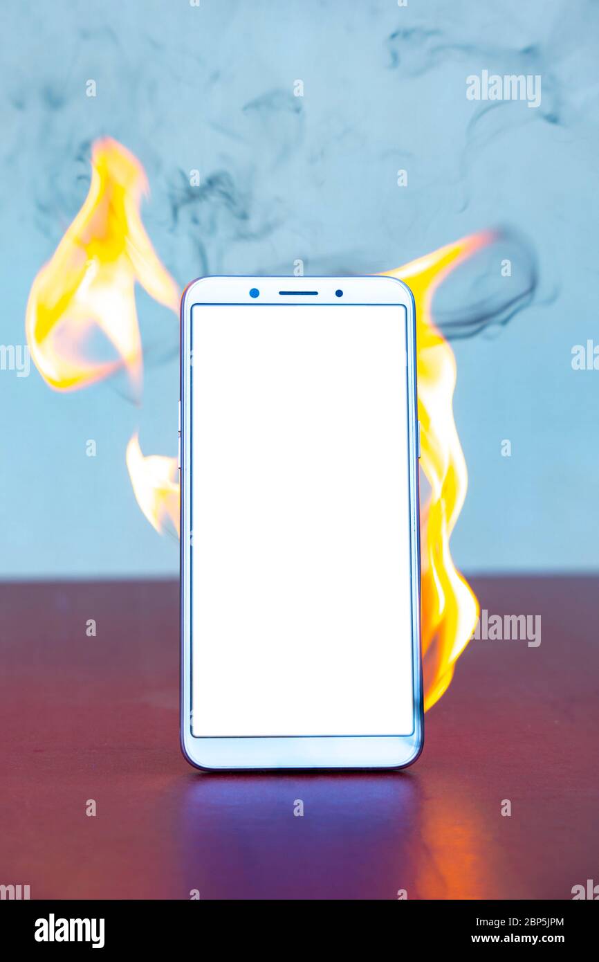 Flaming smartphone. The phone is on fire. Mobile smartphone blank flame ...