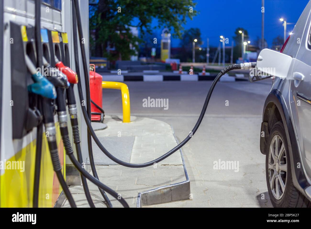 Car refueling night hi-res stock photography and images - Alamy