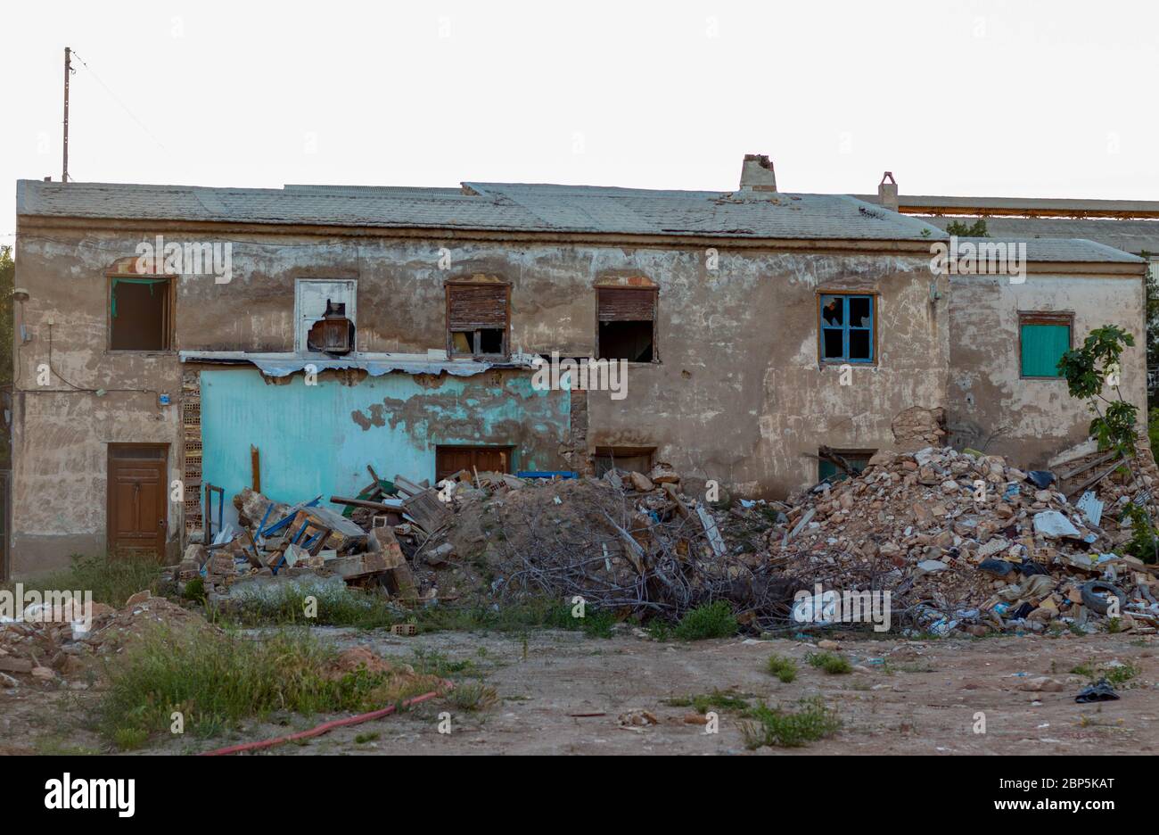 collapsed house full of rubble Stock Photo - Alamy