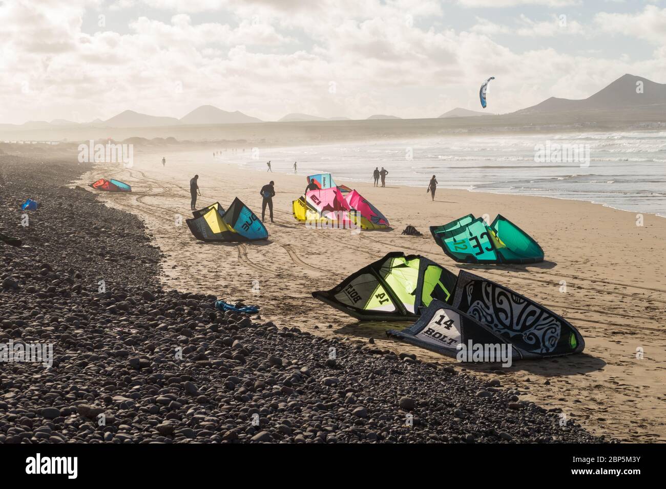 LANZAROTE, SPAIN - NOVEMBER 28, 2016: Kitesurfing in Caleta de Famara ...