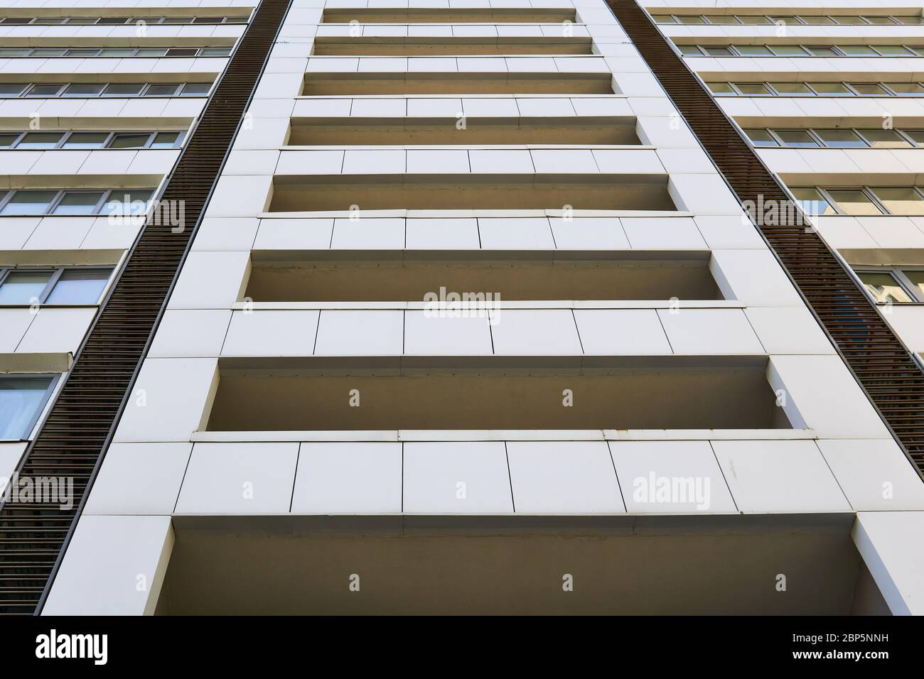 fragment of the facade of a modern building, going up in perspective ...
