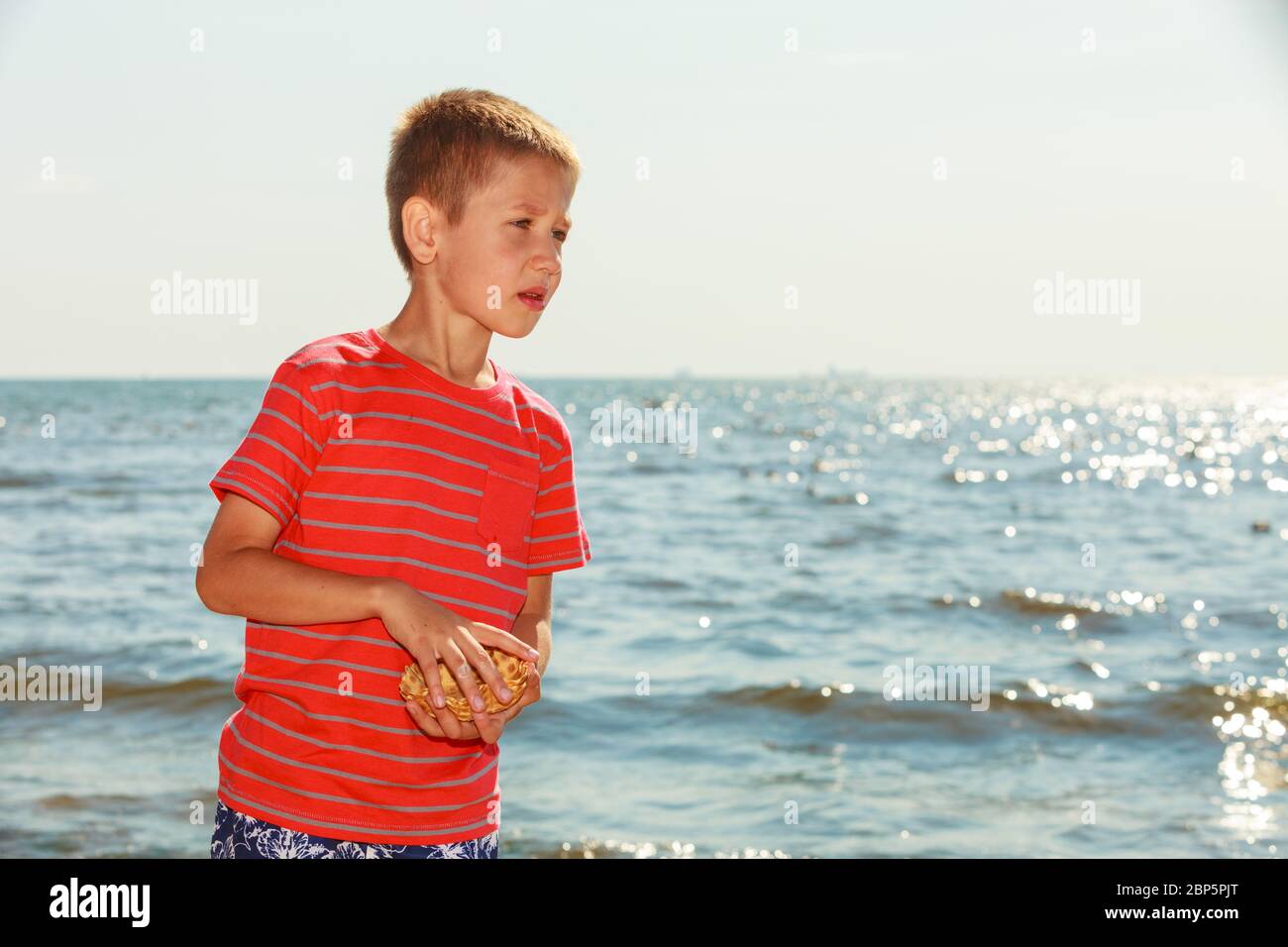 Leisure and free time concept. Portrait of little boy spending time ...
