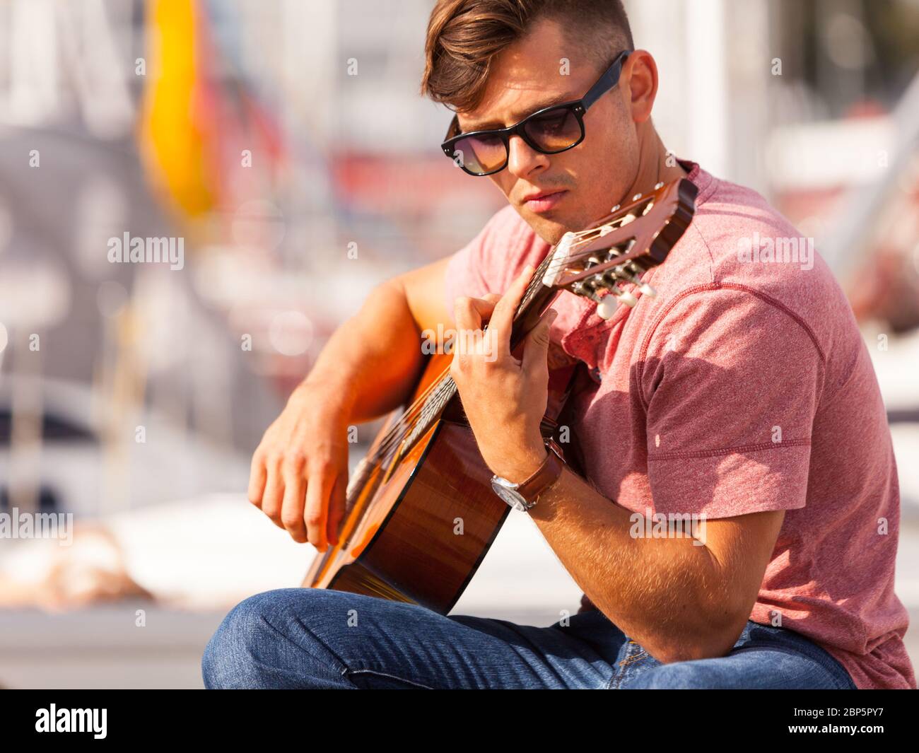 Romantic music sound masculine concept. Young man playing guitar. Boy ...
