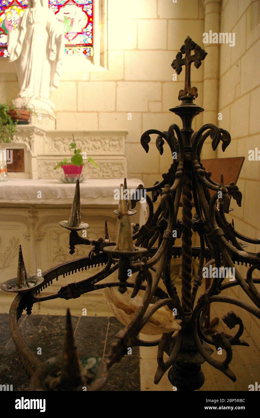 Iron church candle stand in a rural church Stock Photo - Alamy