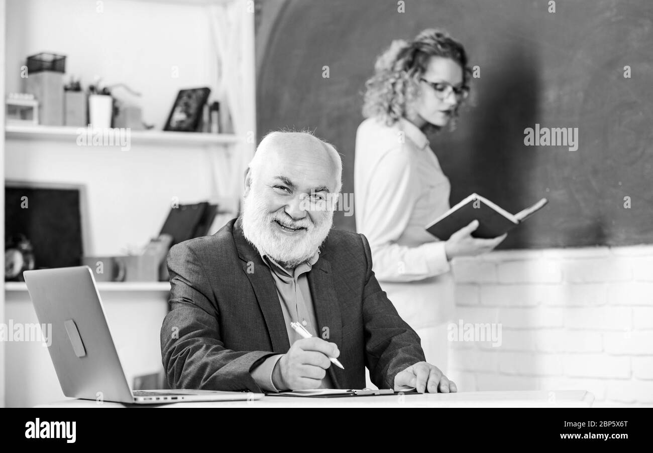 School teacher. pass exam. teachers room. happy senior teacher and ...