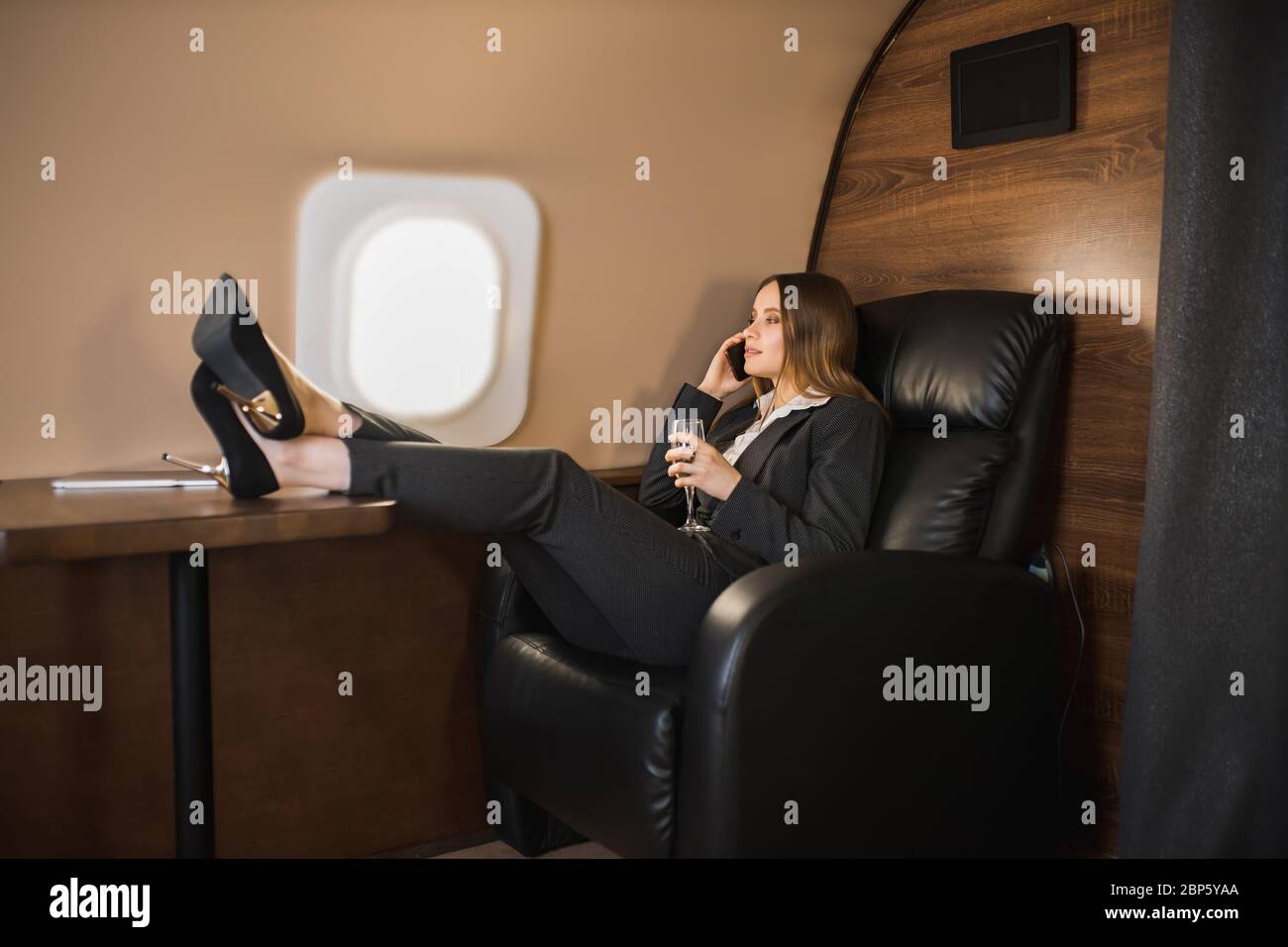 Passenger in seat legs plane hi-res stock photography and images - Alamy