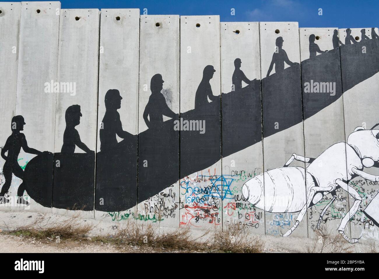 A Banksy graffiti on the separation wall, Palestine Stock Photo - Alamy