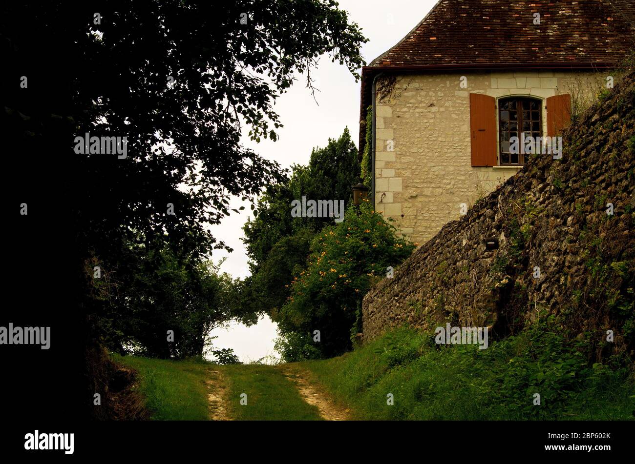 Rural scene in the Indre region of France, with a track running up past ...