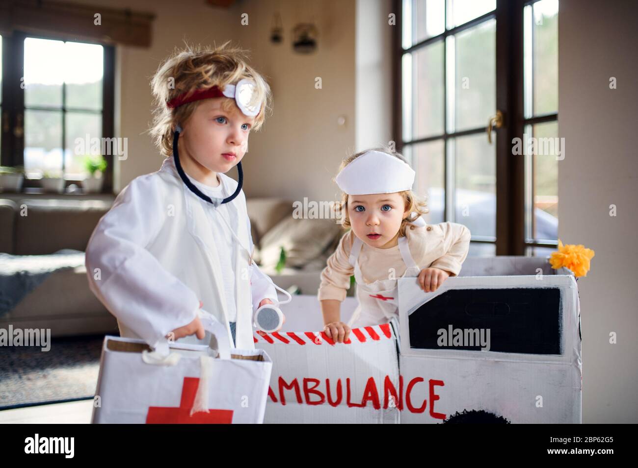 Brother sister playing doctor stethoscope hi-res stock photography and ...