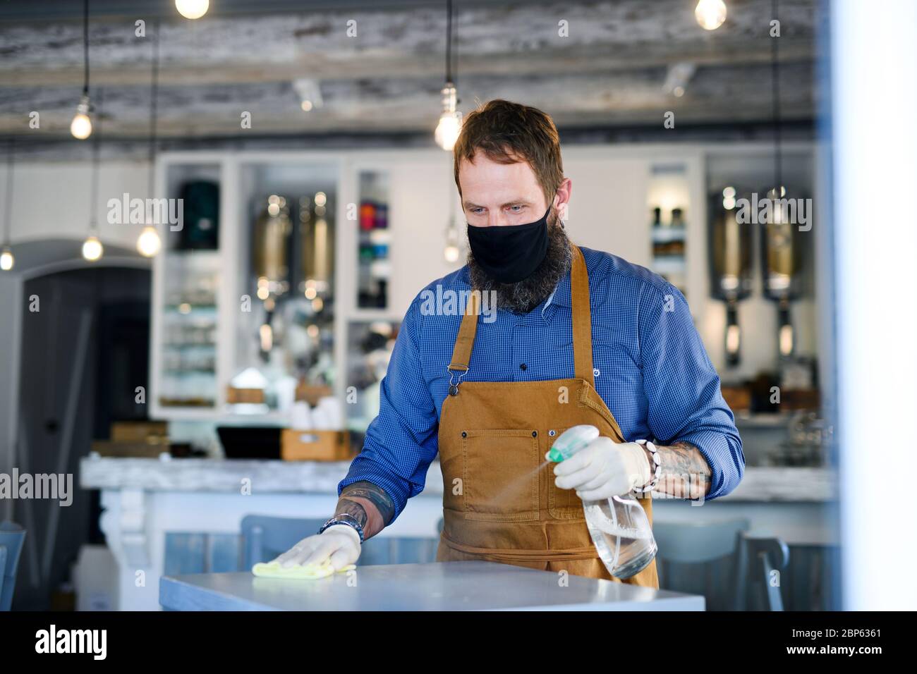 Business owner gloves face mask hi-res stock photography and images - Alamy