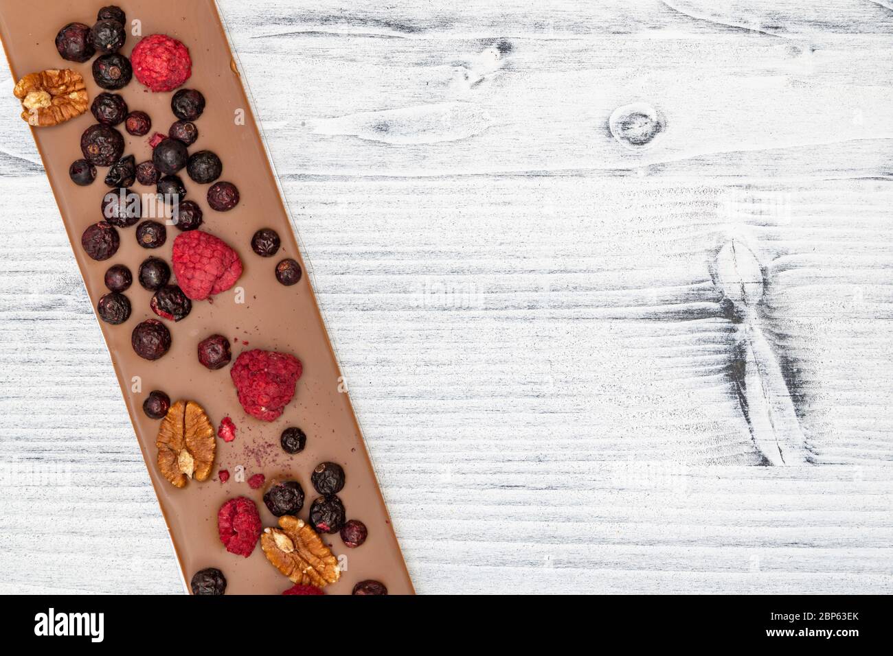 still life of chocolate with different kind dried fruit Stock Photo - Alamy