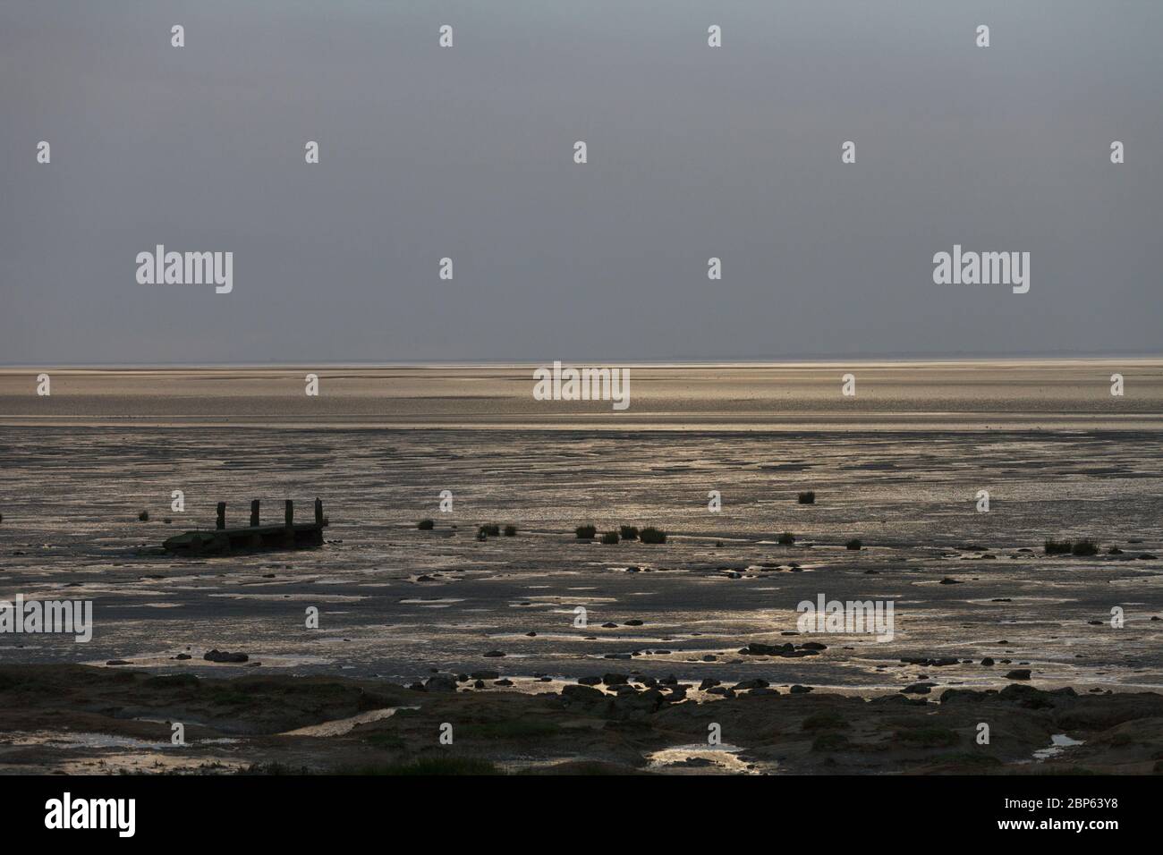 Beach of Morecambe bay at Hest Bank with the tide out and the mud beach ...