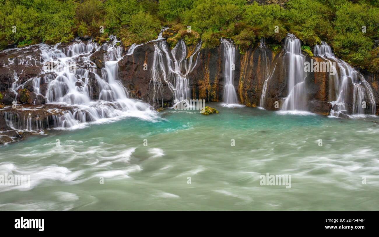 Hraunfossar waterfalls over volcanic rock hi-res stock photography and ...