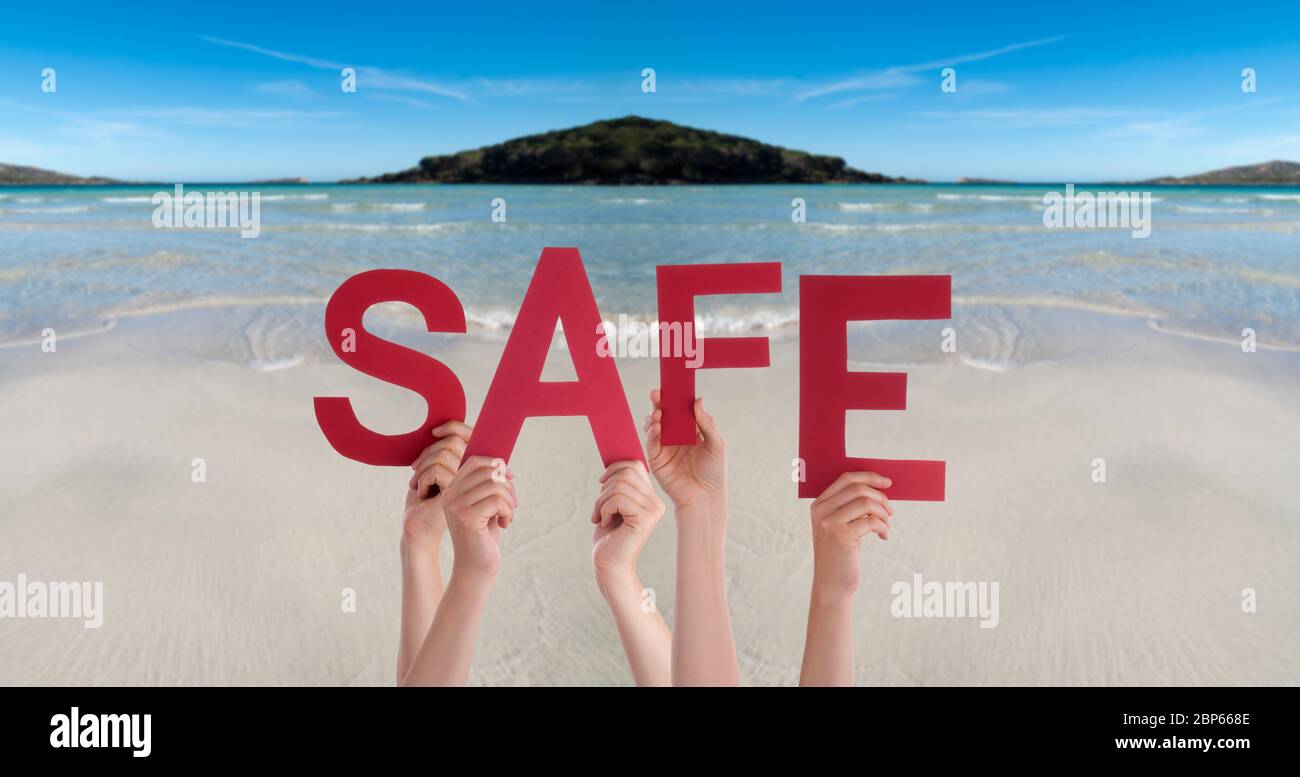 People Hands Holding Word Safe, Ocean Background Stock Photo - Alamy