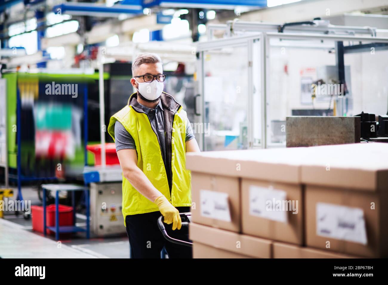 Warehouse pushing trolley hi-res stock photography and images - Alamy