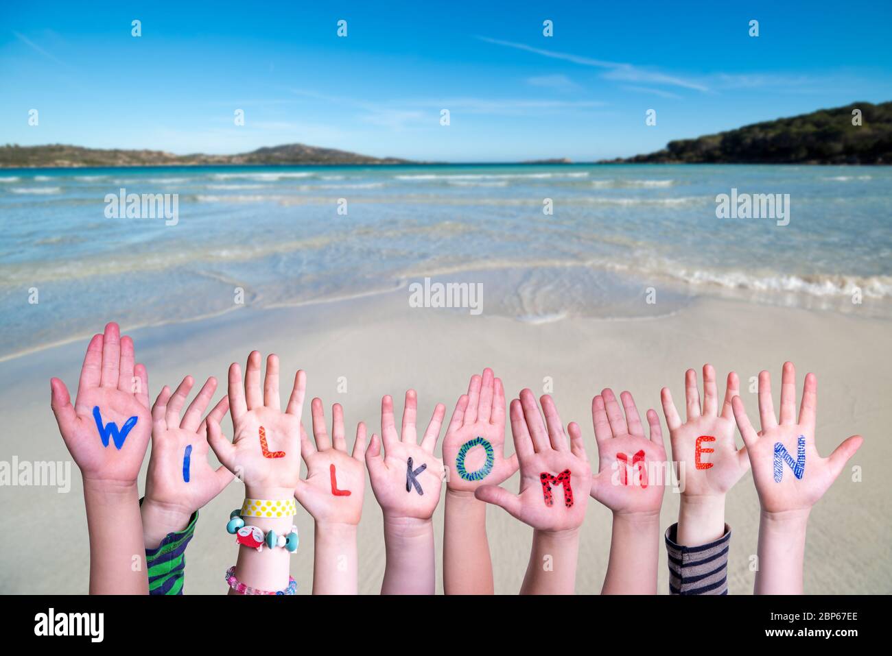 Children Hands Building Word Willkommen Means Welcome, Ocean Background ...