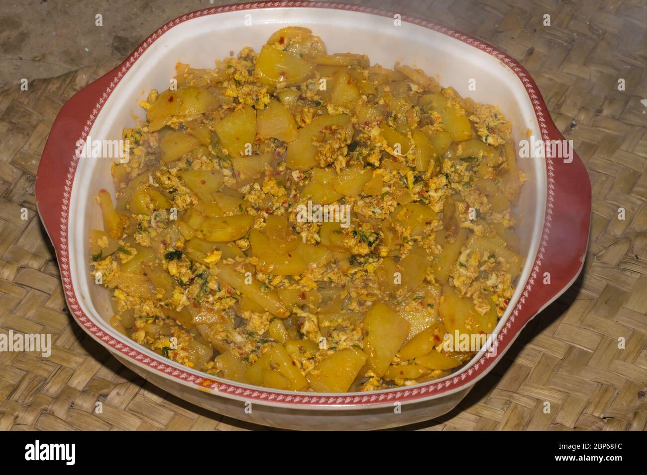 Delicious traditional Pakistani dish egg with vegetables in a white ...