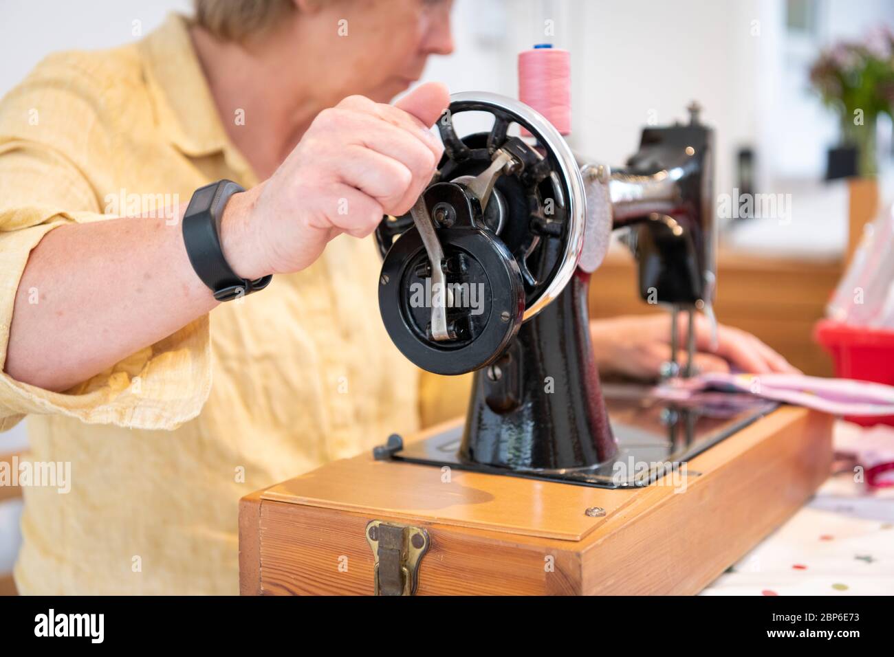 A woman makes homemade face masks during the 2020 covid 19 coronavirus ...