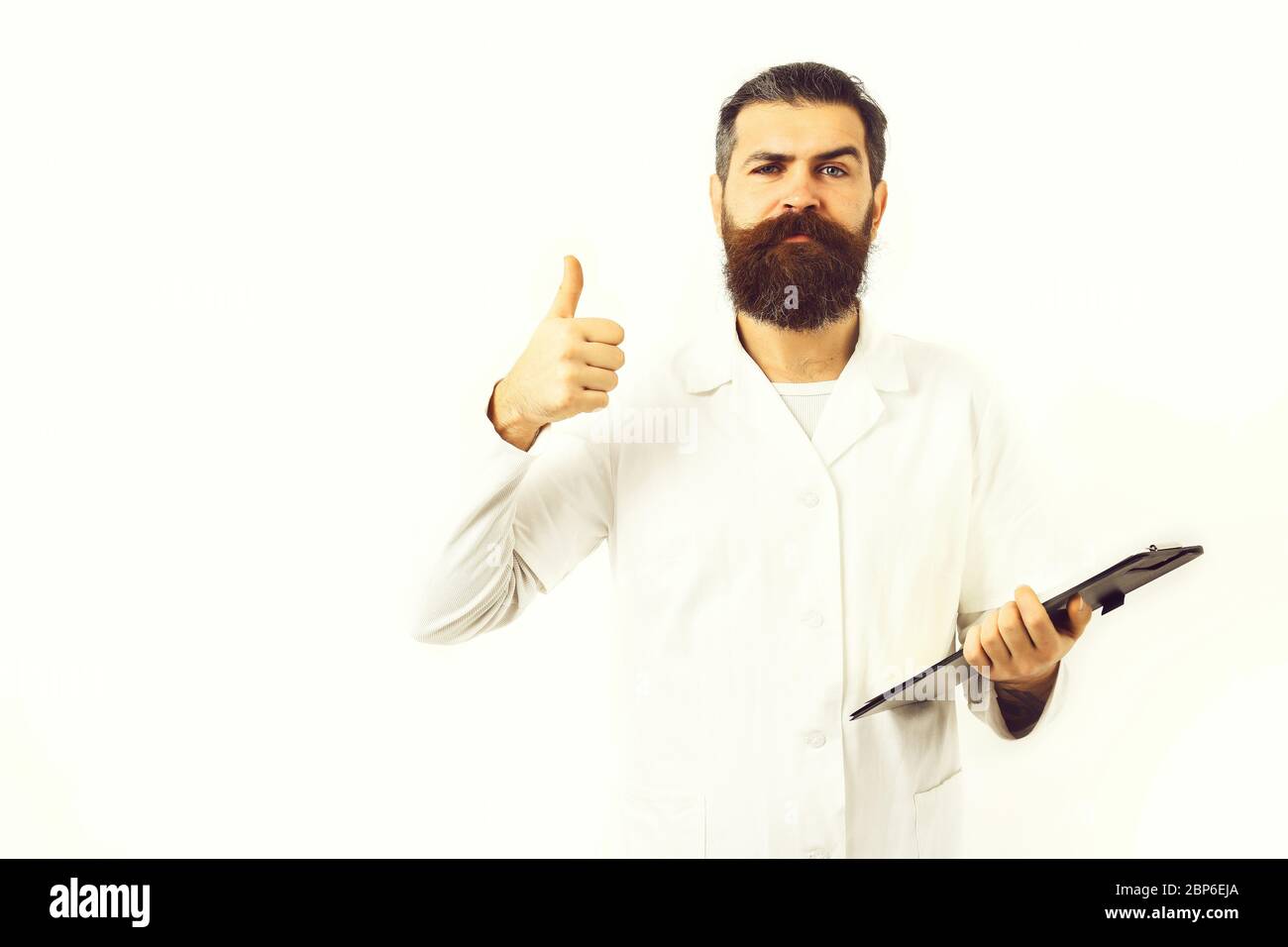 Bearded man, long beard. Brutal caucasian doctor or unshaven hipster ...
