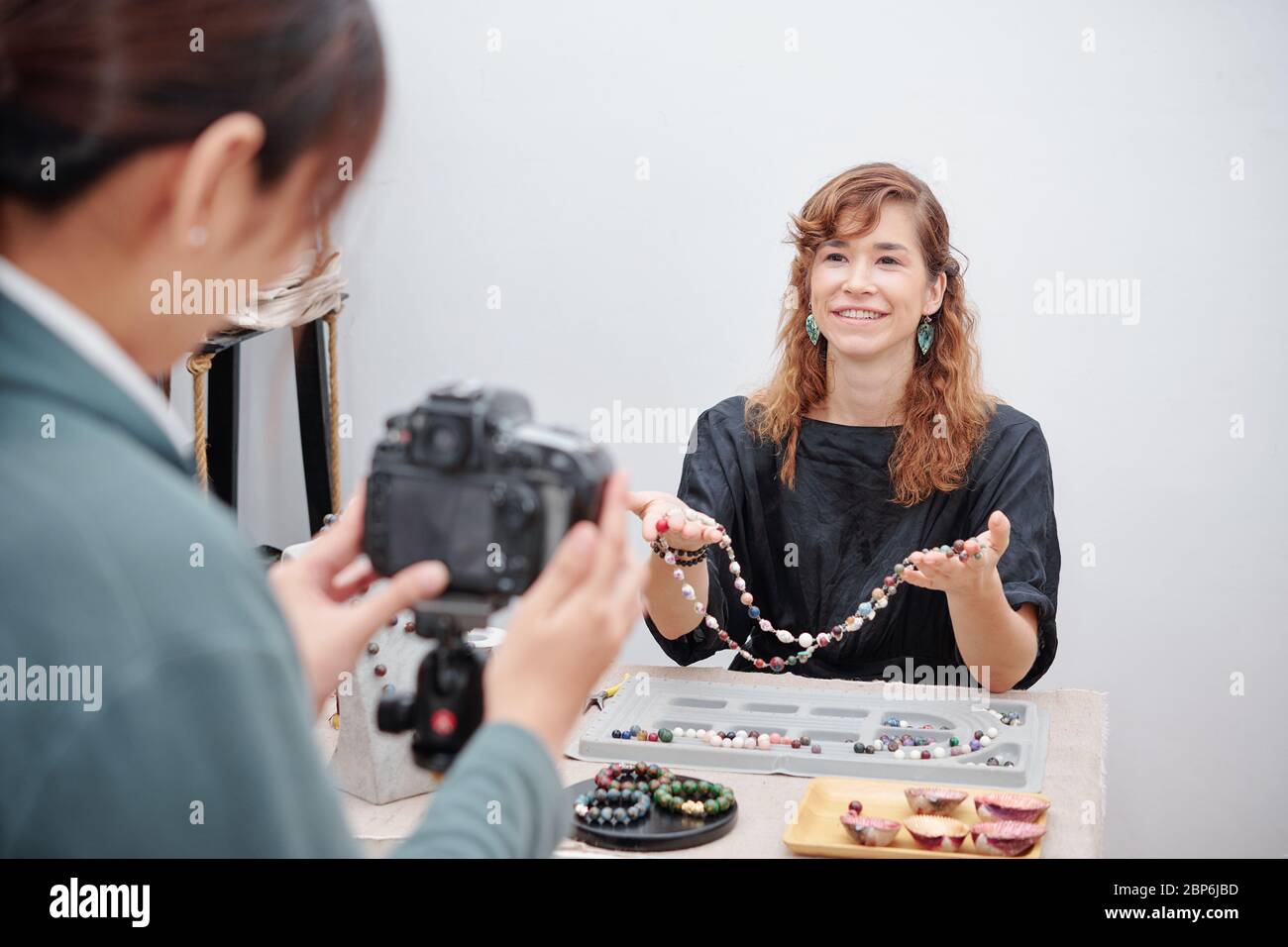 Beautiful young woman demonstrating hi-res stock photography and images ...