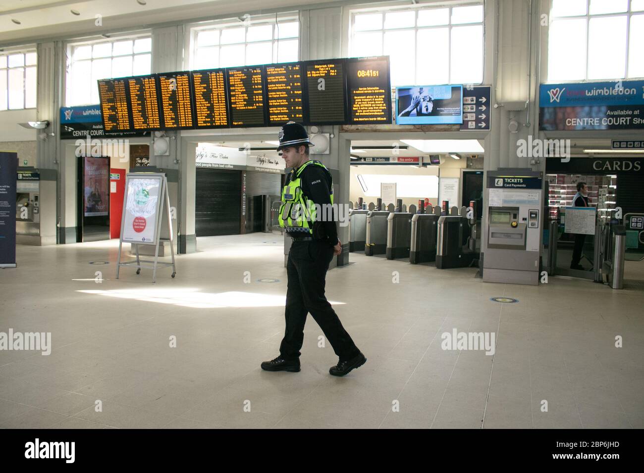 WIMBLEDON LONDON, 18 May 2020. UK. A British Transport police officer ...