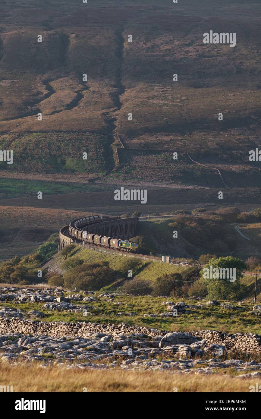 Freightliner class 66 locomotive 66510 running off Ribblehead viaduct ...