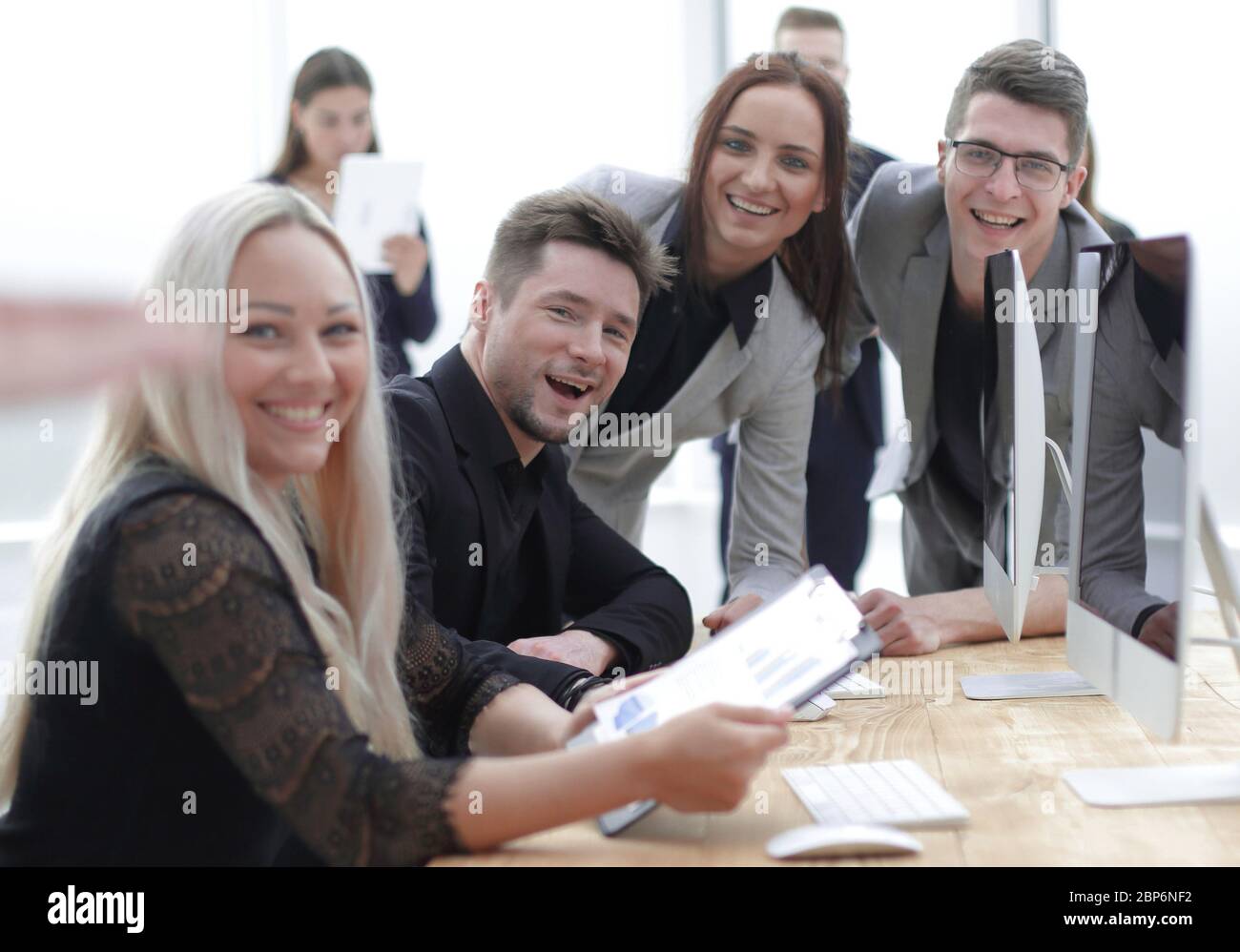 employees of the information center sitting at the office Desk Stock ...