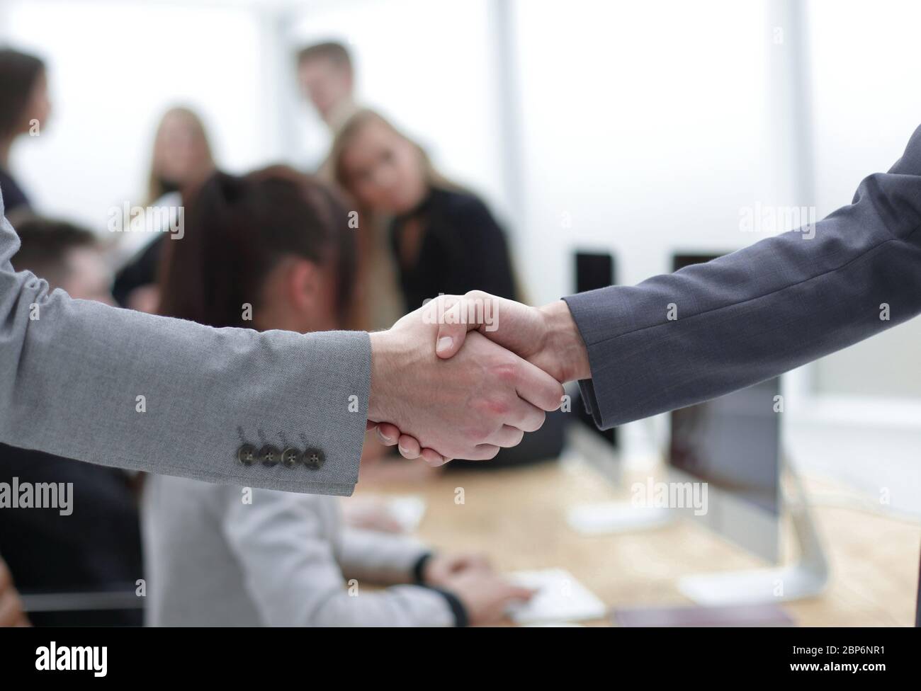 close up. business handshake on an office background Stock Photo - Alamy