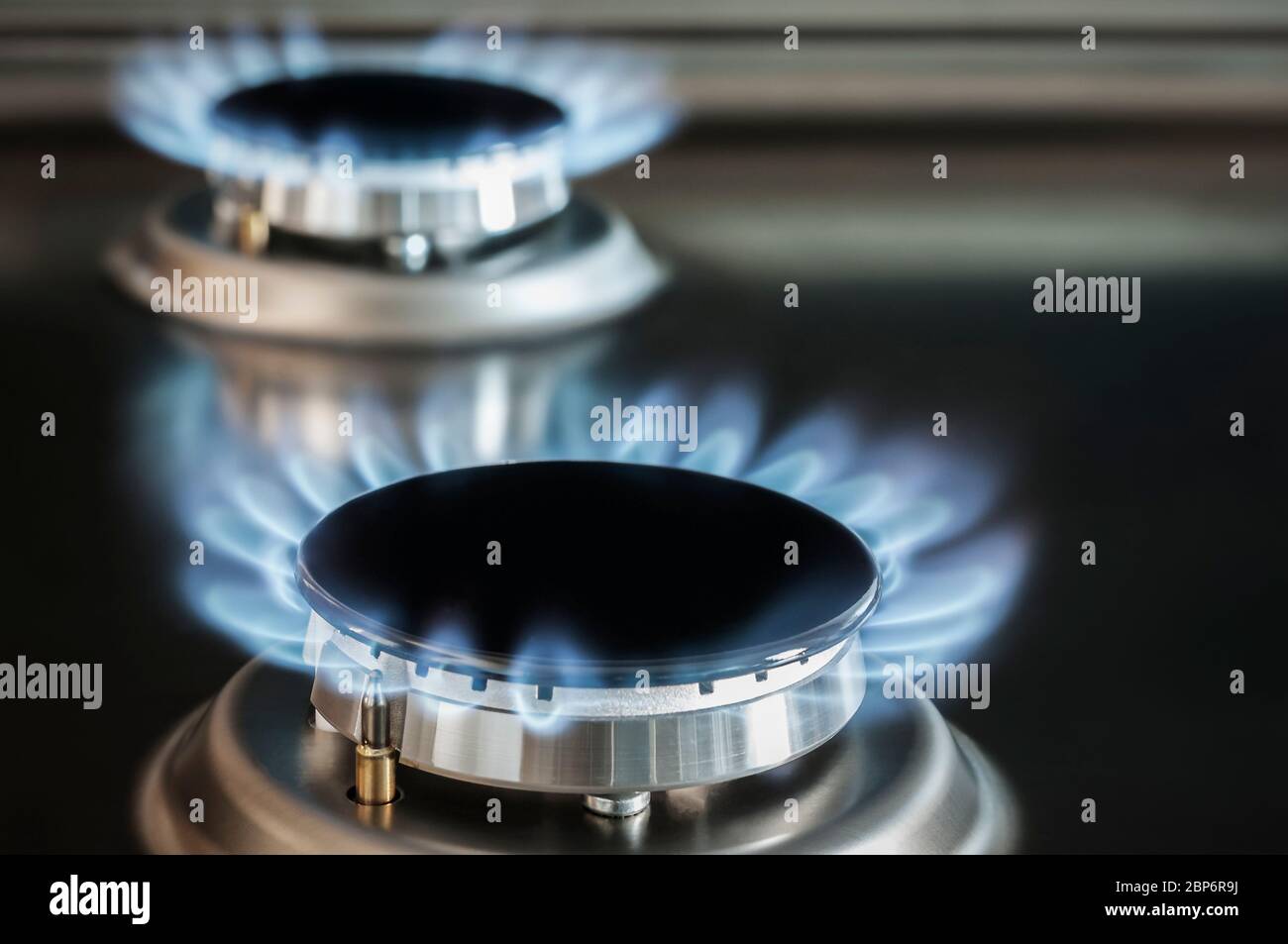 Gas flame of a gas stove Stock Photo - Alamy