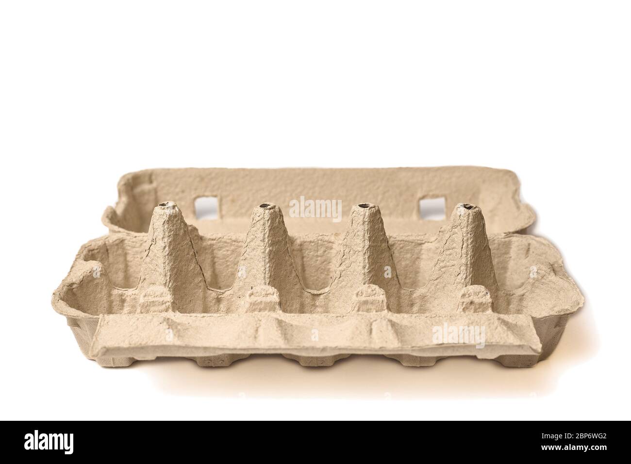 Cardboard egg tray isolated on a white background. Egg packaging side ...