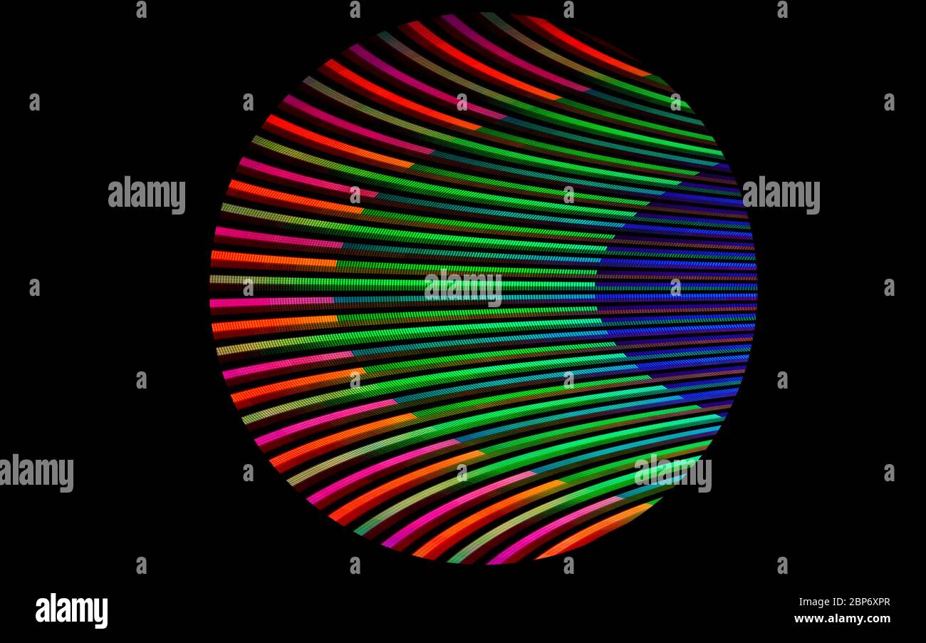 Circle with pattern in neon colors against black background Stock Photo ...