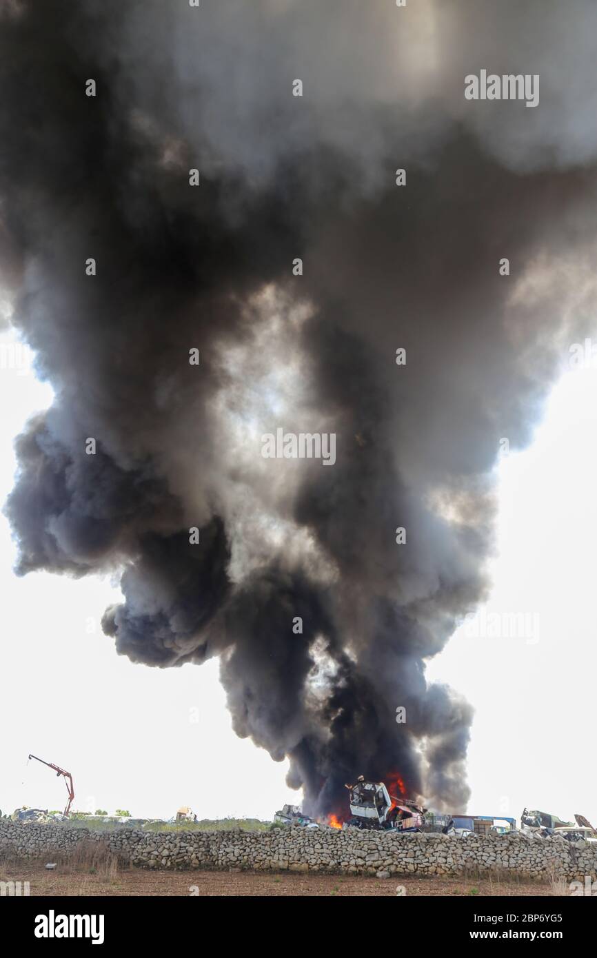 Dark column of smoke hi-res stock photography and images - Alamy